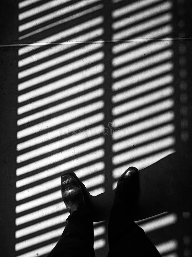 A Man Facing through a Shadow of a Window Stock Photo - Image of line, window: 154376134