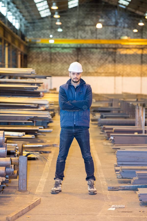 Man in a factory stock image. Image of beard, pensive - 148031151