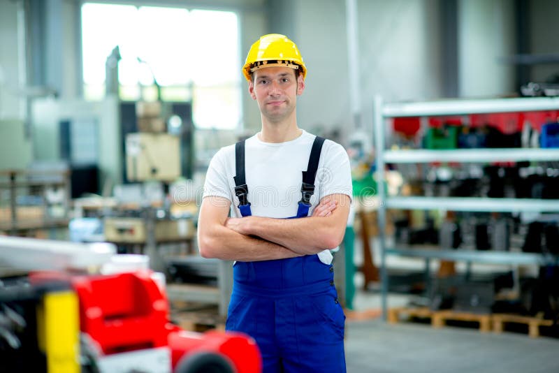 Man in a factory stock image. Image of business, helmet - 45526981