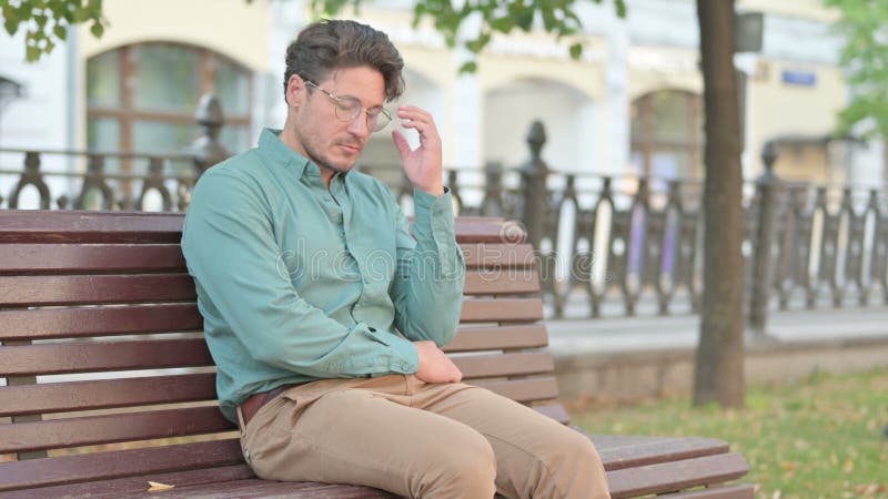 Man Falling Asleep while Sitting on Bench with Laptop Stock Video ...