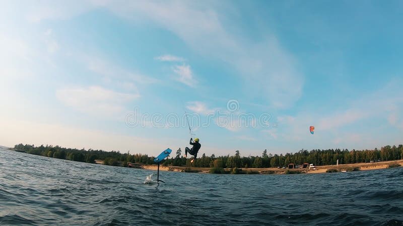 A Man is Falling from the Board while Kitesurfing Stock Video - Video ...