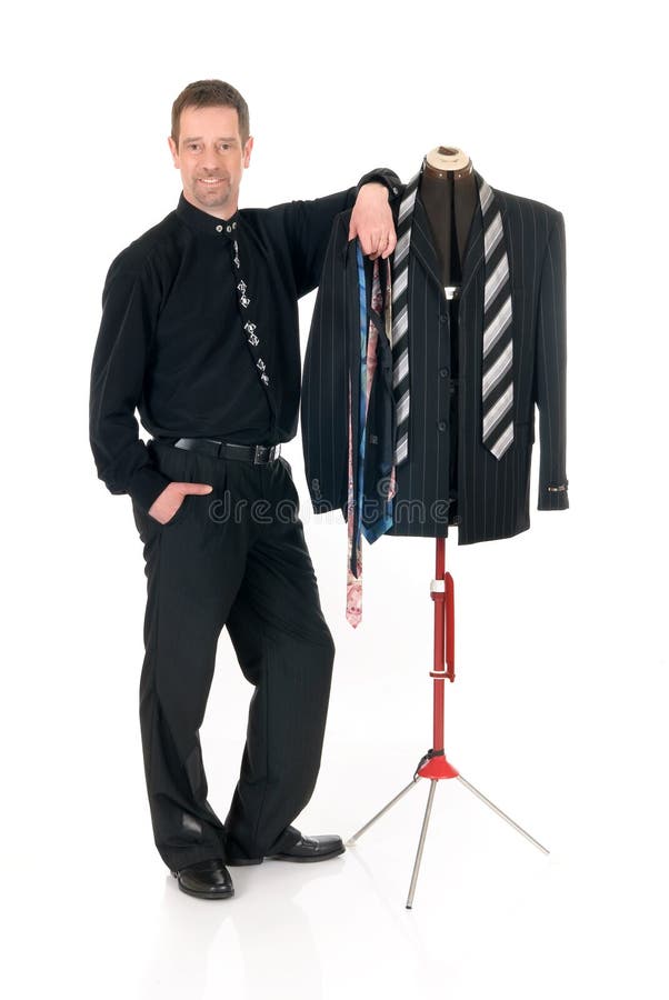 Man dressing a mannequin stock photo. Image of boutique - 25155498