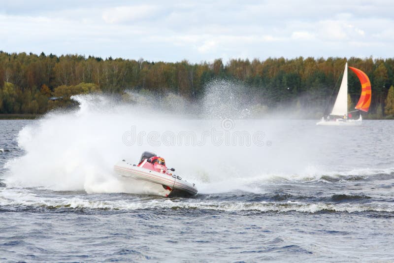Man Fast Floats at Power Boat on River Stock Image - Image of powerboat ...