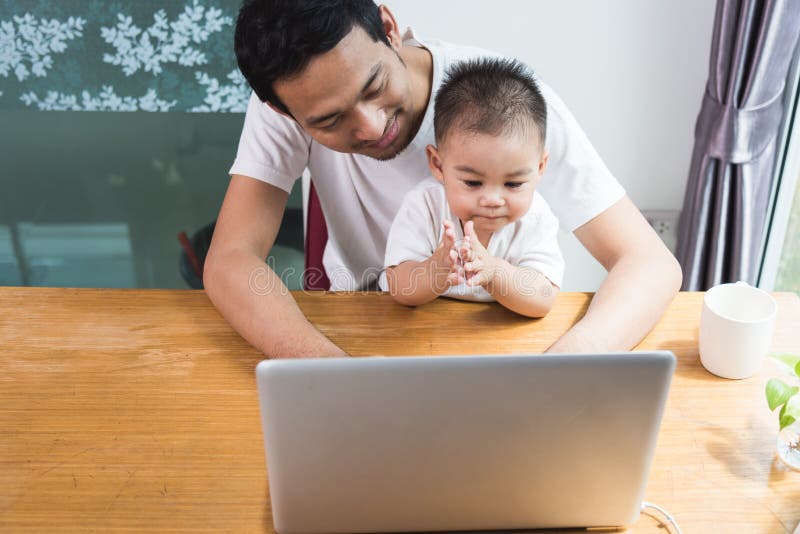 Man Father Using Working on Laptop Computer Stock Image - Image of cute ...