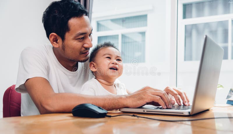 Man Father Using Working on Laptop Computer Stock Photo - Image of blue ...