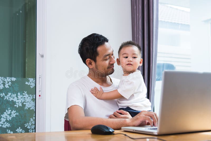 Man Father Using Working on Laptop Computer Stock Photo - Image of care ...