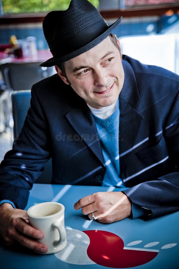 Man in Fedora Sitting at Diner Counter Stock Photo - Image of attitude ...