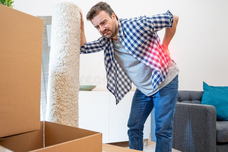 Man Feeling Back Ache Cramp Lifting Heavy Boxes Stock Image - Image of ...