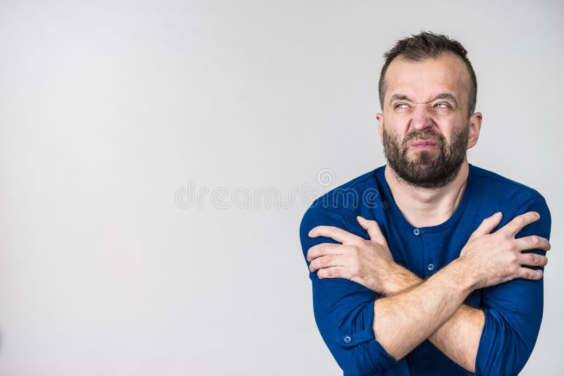 Man feeling cold gesturing stock photo. Image of adult - 346791150