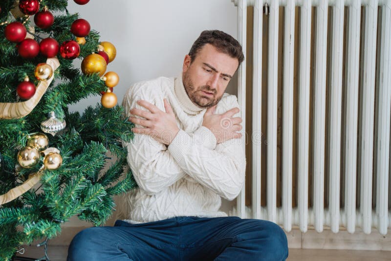 Man Feeling Cold at Home with Home Heating Trouble during Christmas ...