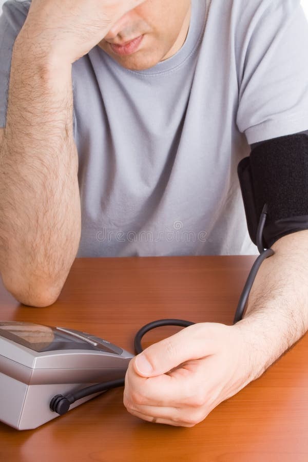 Man Feeling Sick and Checking Blood Pressure Stock Photo - Image of ...