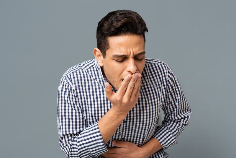 Man Feeling Sick and Nauseous on Gray Background Stock Photo - Image of ...