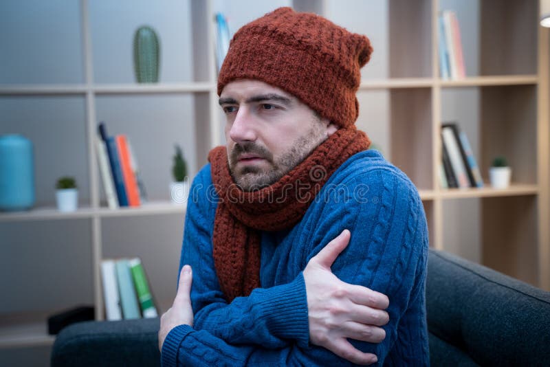 Man Feeling Very Cold at Home with Warm Clothes Stock Photo - Image of ...