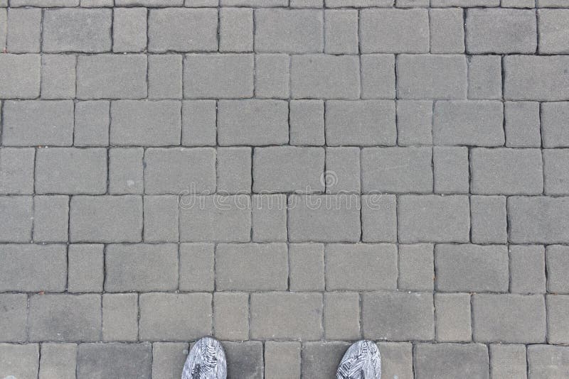 Gray Brick Blocks with Man Feet Stock Photo - Image of industry ...