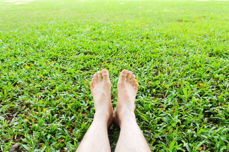 Man Feet on Green Grass Background Stock Image - Image of fresh ...