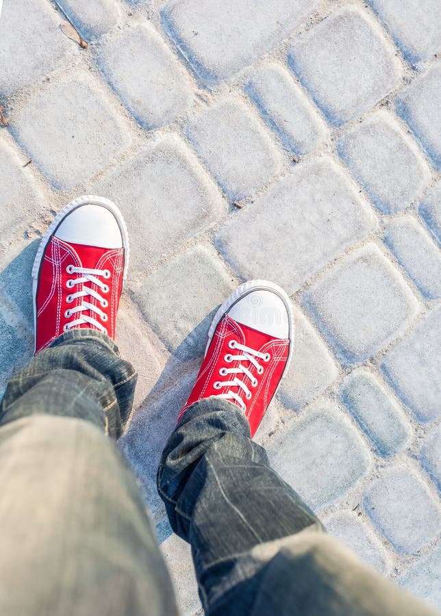Man Feet in Red Sneakers on Cobbled Road Stock Image - Image of cloth ...