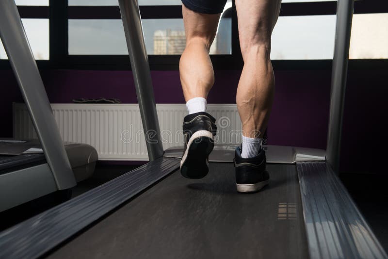 Man Feet on Treadmill stock image. Image of legs, athletic - 89176565