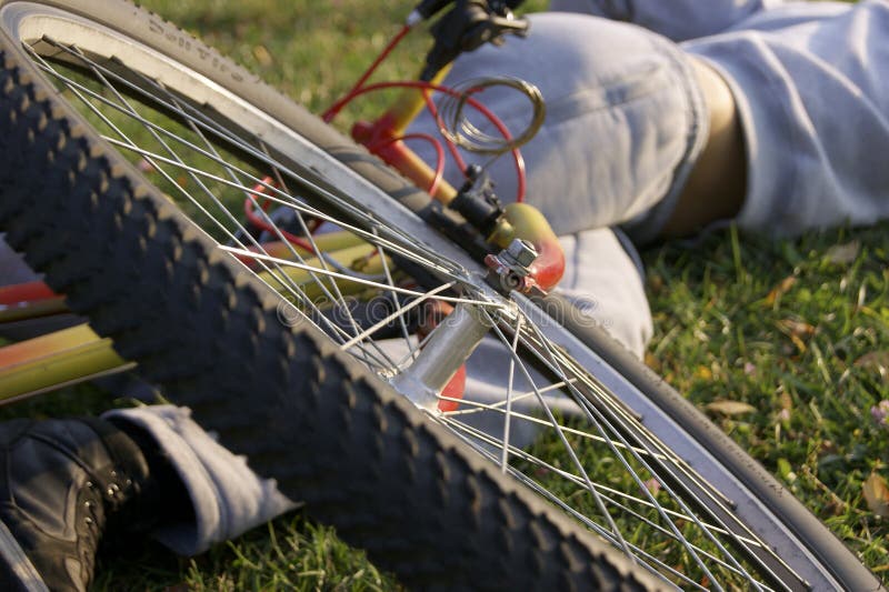 Man Fell Off the Bike in the Park Stock Photo - Image of lifestyle ...