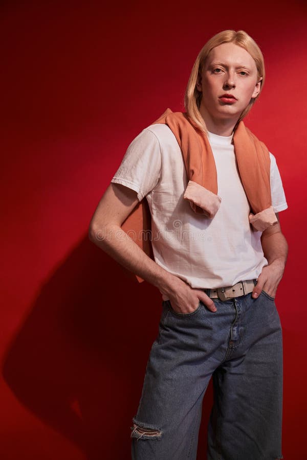 Man with Feminine Features Wearing Stylish Clothes Looking at the ...