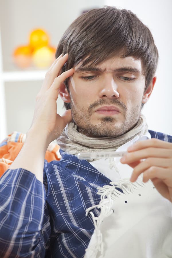 Man with fever in bed stock photo. Image of fever, measurement - 17247584