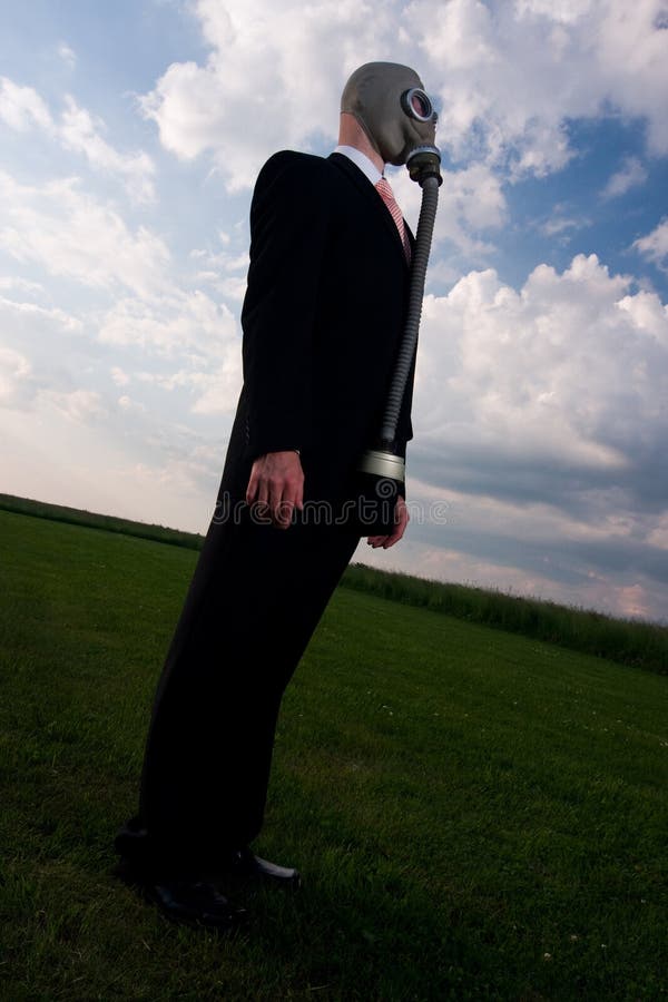 Man in Field Wearing Gas Mask Stock Image - Image of grass, filtering ...