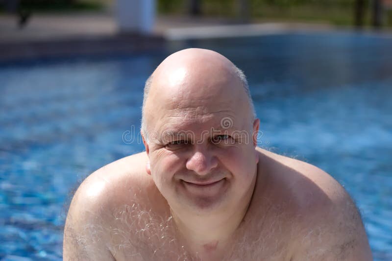 Bald Man in the Fifties Smiling in the Pool-Stock Photos Stock Photo ...