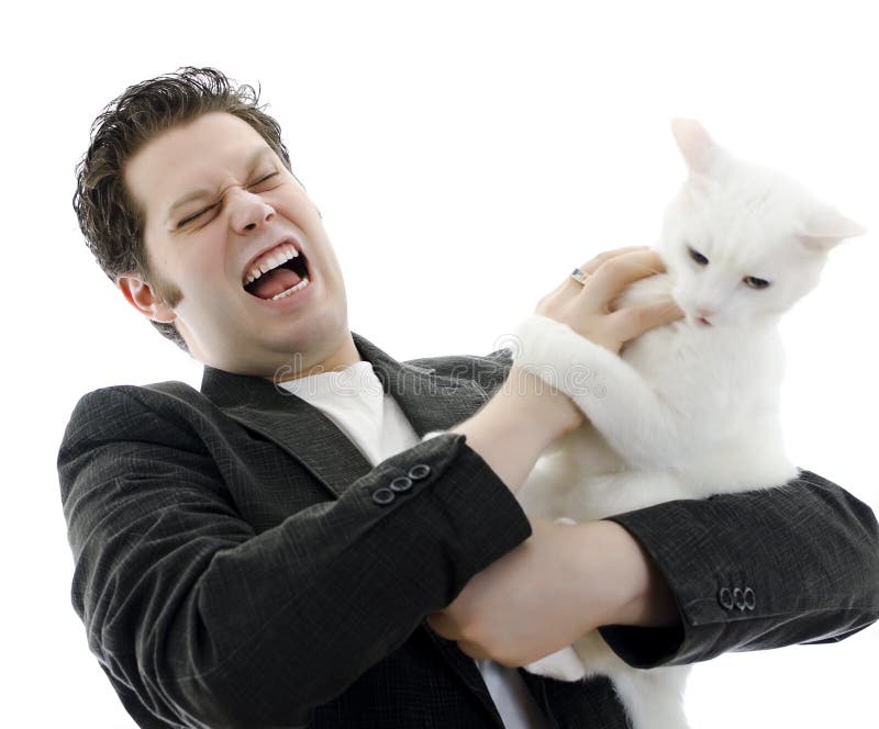 Man Fighting with White Cat. Stock Photo - Image of expression ...