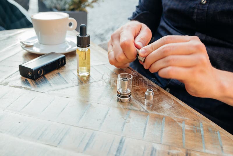 Vape or E-cigarette. Vaping Set on the Table. Stock Photo - Image of ...