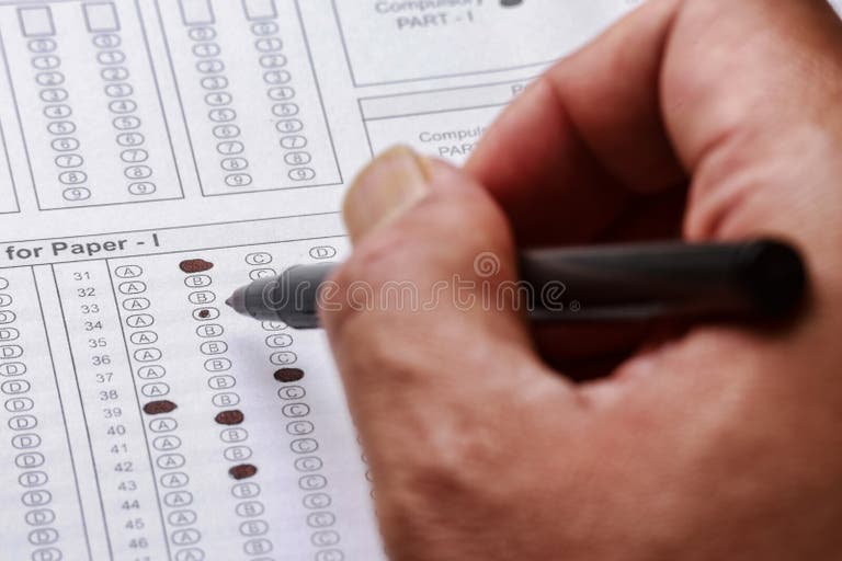 Man is Filling OMR Sheet Handing with Pen. Computerized Testing ...