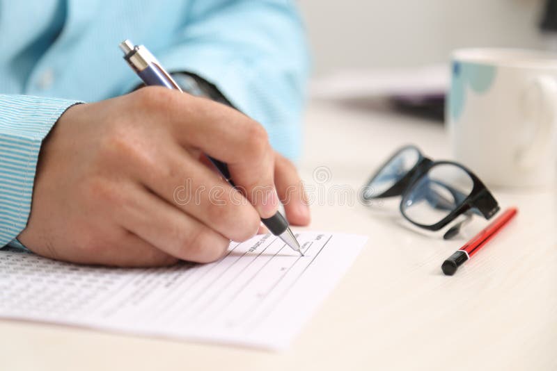 Man is Filling OMR Sheet Handing with Pen. Stock Image - Image of blank ... Man is Filling OMR Sheet Handing with Pen. Stock Image - Image of blank ...