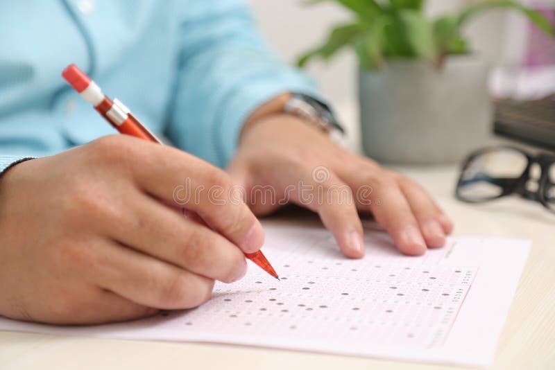 Man is Filling OMR Sheet with Pen Stock Image - Image of education ...