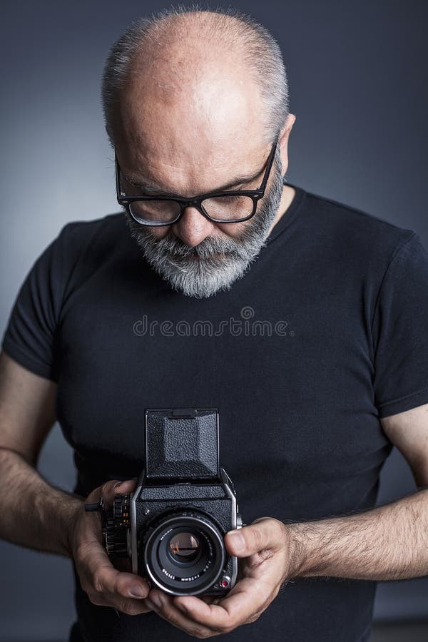 Man with film camera stock photo. Image of camera, photographer - 96104564