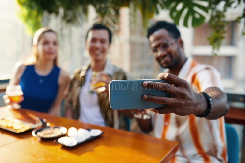 Man Filming Himself with Friends Stock Image - Image of hangout, smile ...