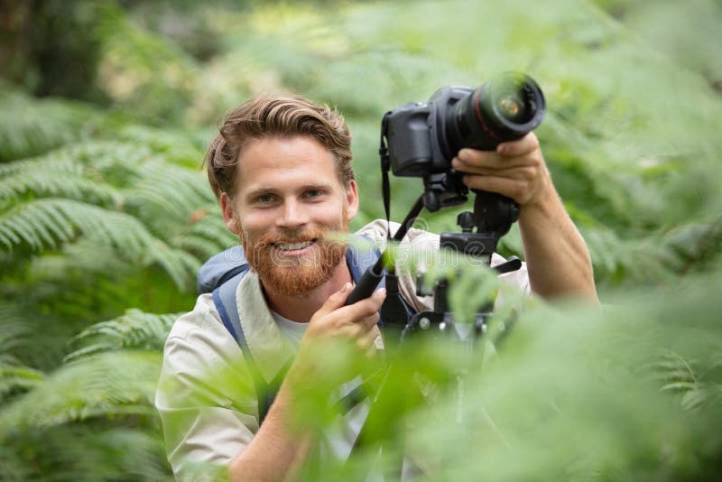 Man Filming Holding Camera Stabilizer Stock Photo - Image of trail ...