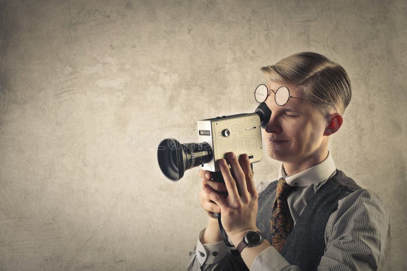 Professional Video Camera Stands on a Tripod, the Process of Filming a ...