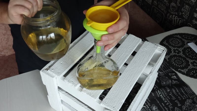 The Man Filters the Tincture of Quince. through a Sieve with a Cotton ...