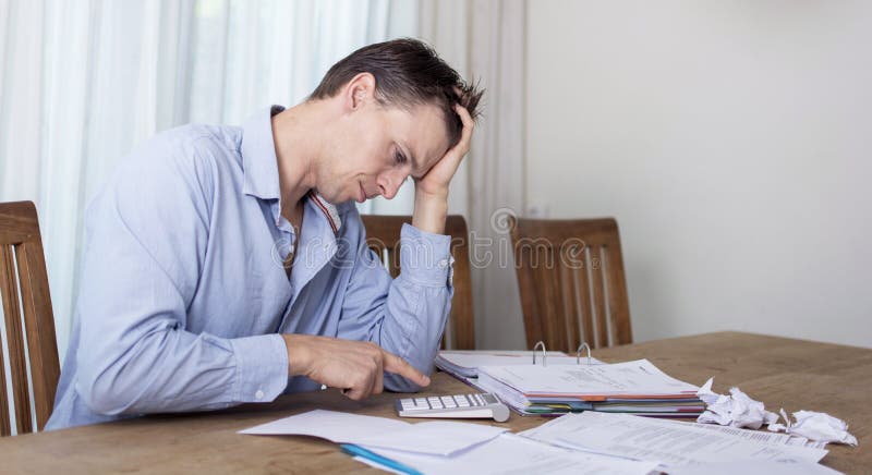 Man in financial stress stock photo. Image of burden - 34475792