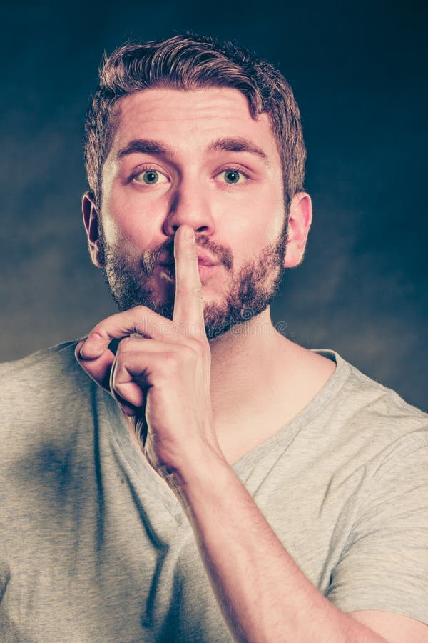 Man with Finger on Lips Showing Silence Gesture. Stock Photo - Image of ...