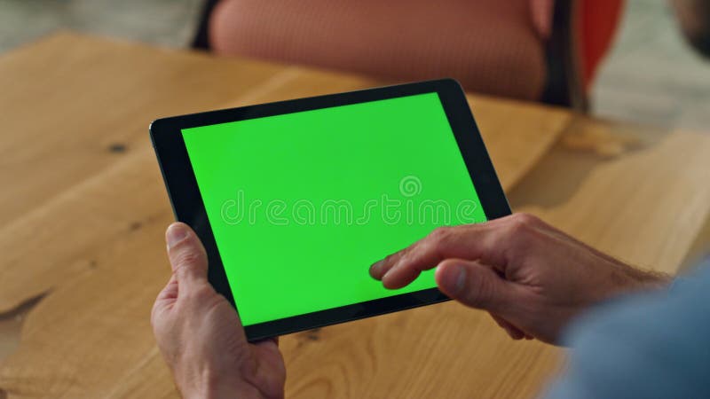 Man Finger Swiping Greenscreen Tablet Office. Close Up Specialist ...
