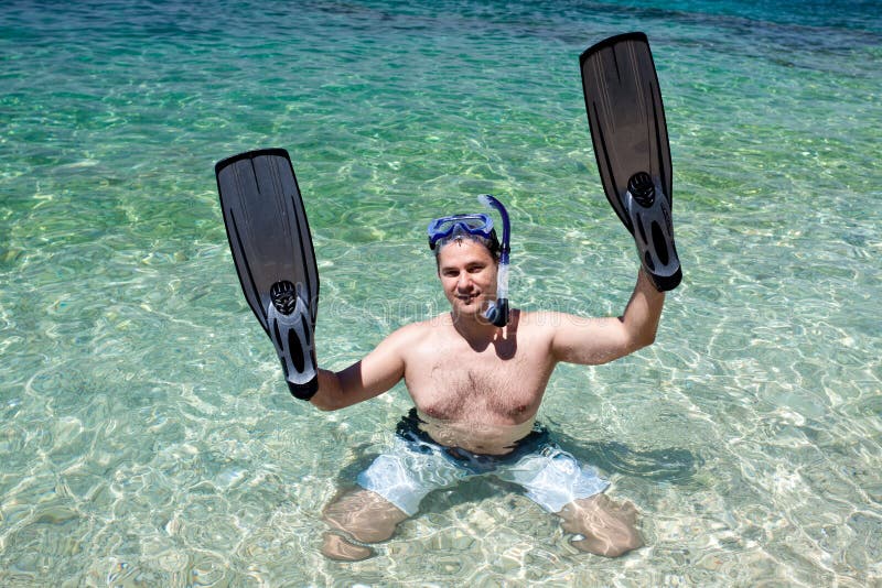 Man with fins on the hands stock image. Image of blue - 15668789