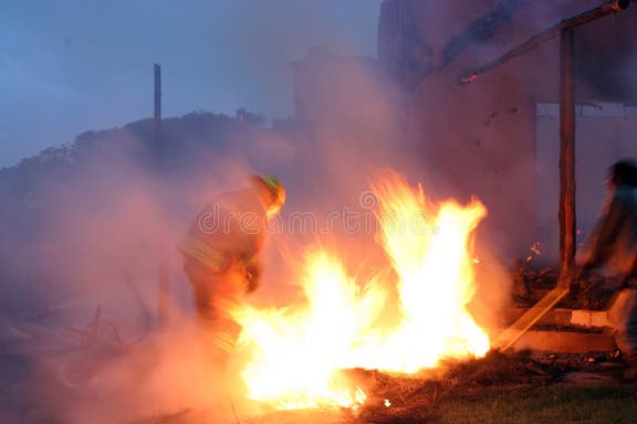 Man in fire stock photo. Image of fire, extinguishing - 16576326