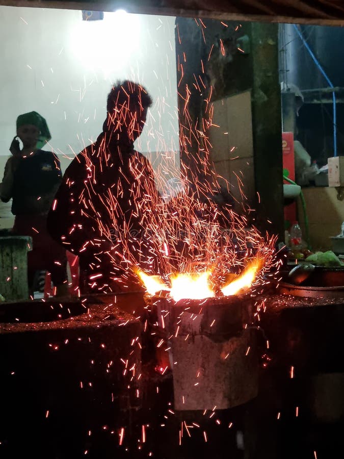 The Man the Fire in the Night Stock Photo - Image of night, fire: 261751512