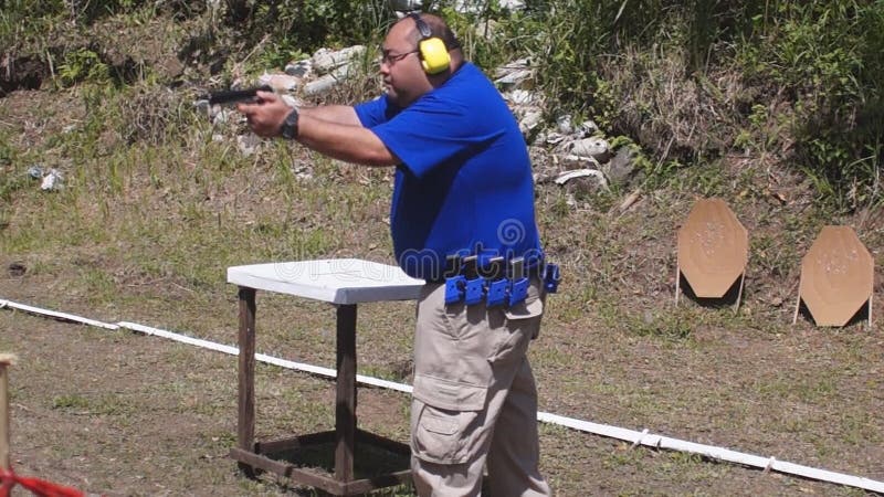 Man Fires Automatic Handgun Pistol during Training in Practical ...