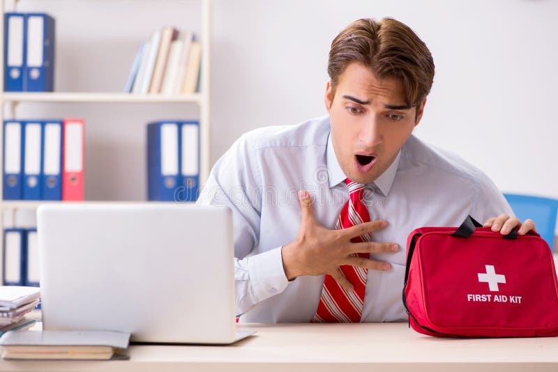 The Man with First Aid Kit in the Office Stock Image - Image of ...