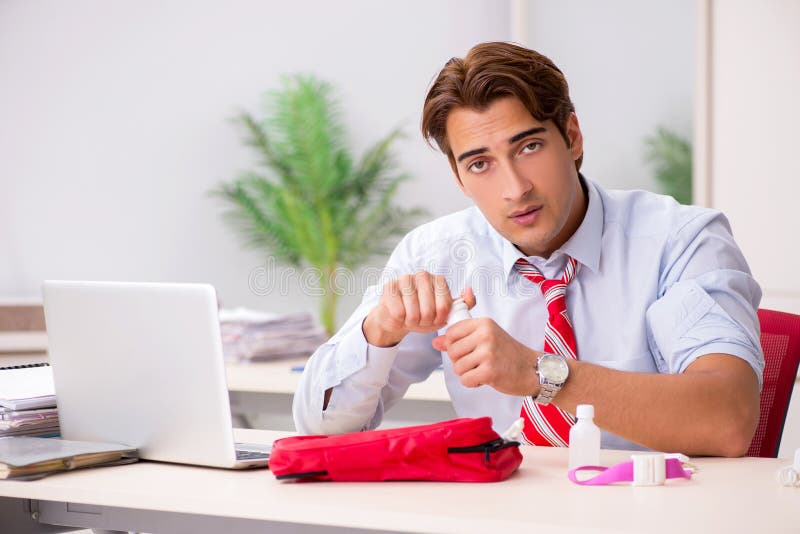 The Man with First Aid Kit in the Office Stock Photo - Image of ...