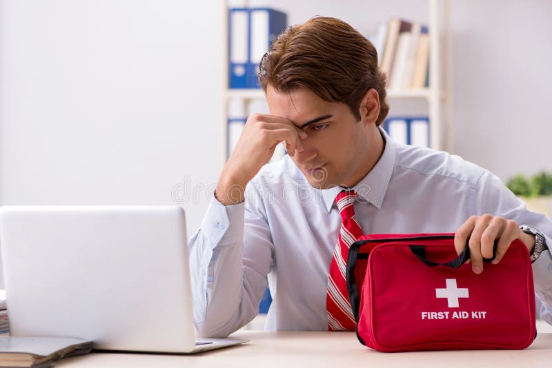 The Man with First Aid Kit in the Office Stock Photo - Image of help ...
