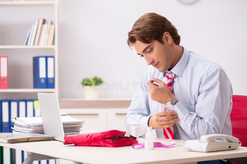 The Man with First Aid Kit in the Office Stock Photo - Image of office ...