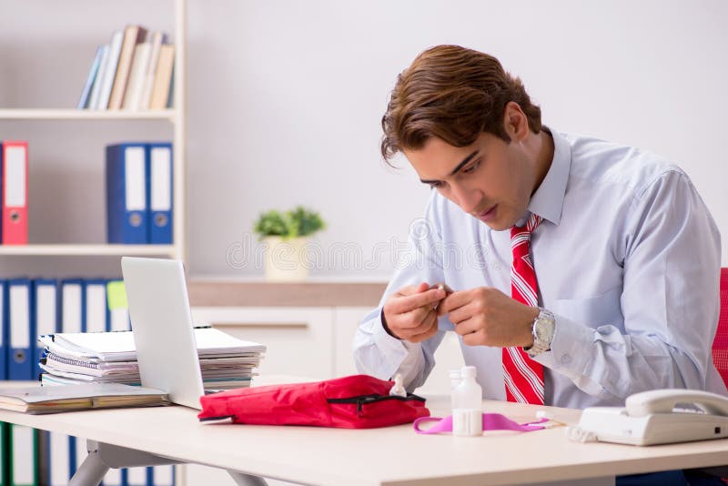 The Man with First Aid Kit in the Office Stock Photo - Image of case ...