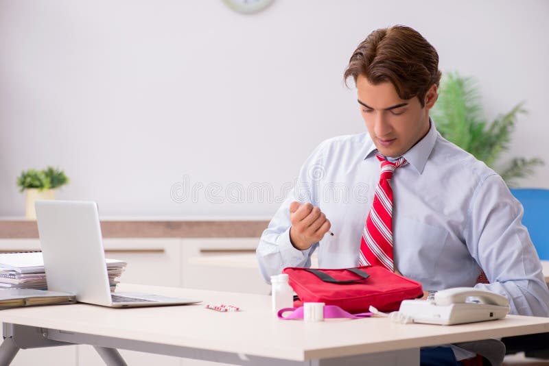 The Man with First Aid Kit in the Office Stock Photo - Image of ...