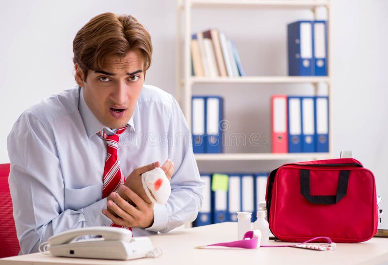 Man with First Aid Kit in the Office Stock Image - Image of medical ...